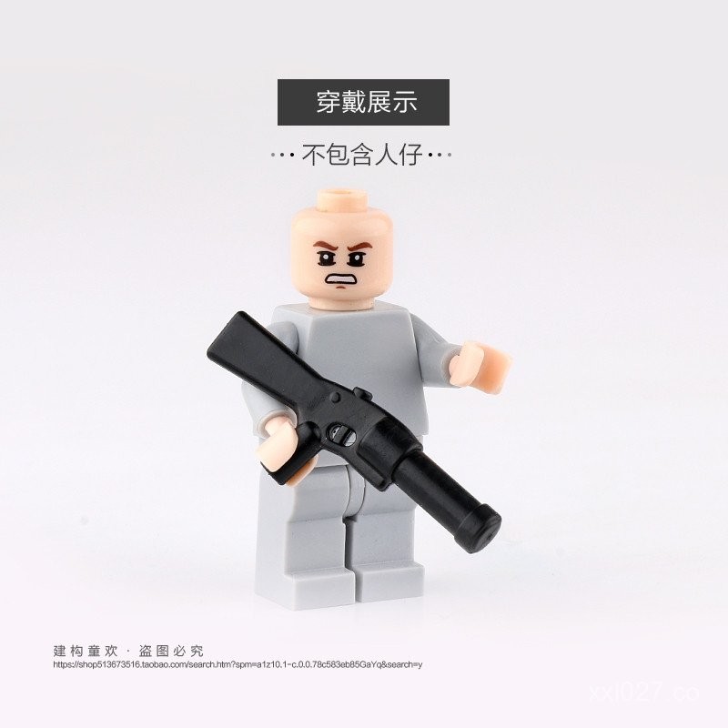 Minifigura de ladrillo de partículas pequeñas sosteniendo el modelo de ...